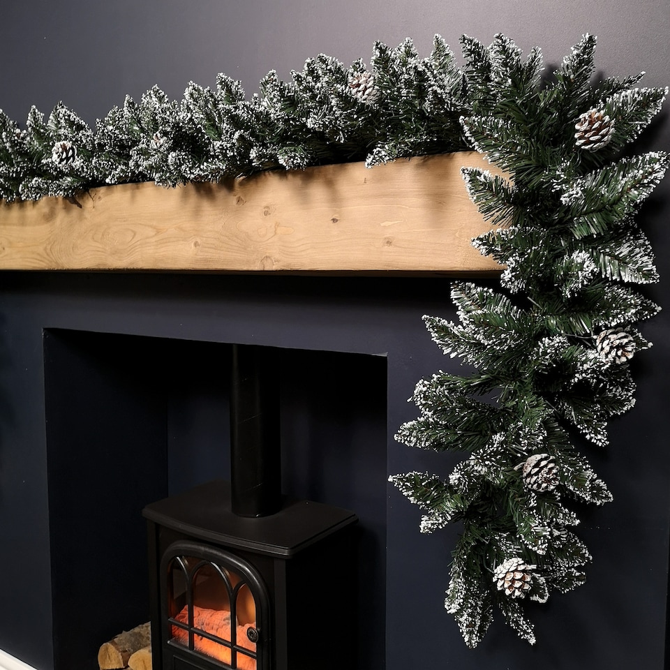 Premier Christmas Rocky Mountain Garland 2.7m Snow Flocked with Cones ...